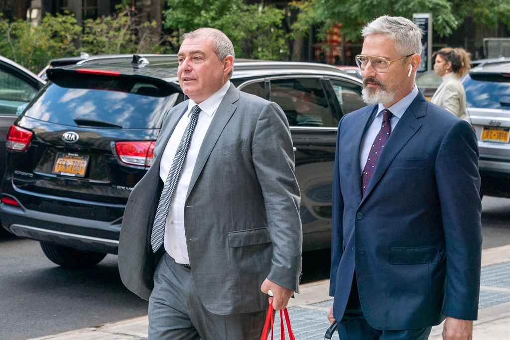 Former associate of Trump's lawyer found guilty of illegal campaign ...