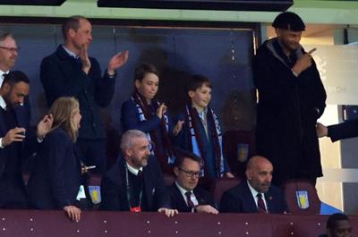 Football-mad Prince William and Prince George spotted cheering on their ...