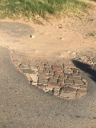 All hands on deck as residents help to fix potholes | News24