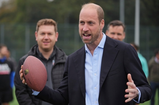 Touchdown! Prince William impresses with his American football skills ...