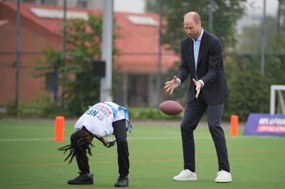 Touchdown! Prince William impresses with his American football skills ...