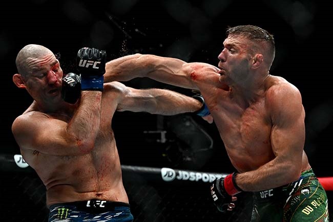 Dricus delivers fighting masterclass, breaks Strickland's nose to ...