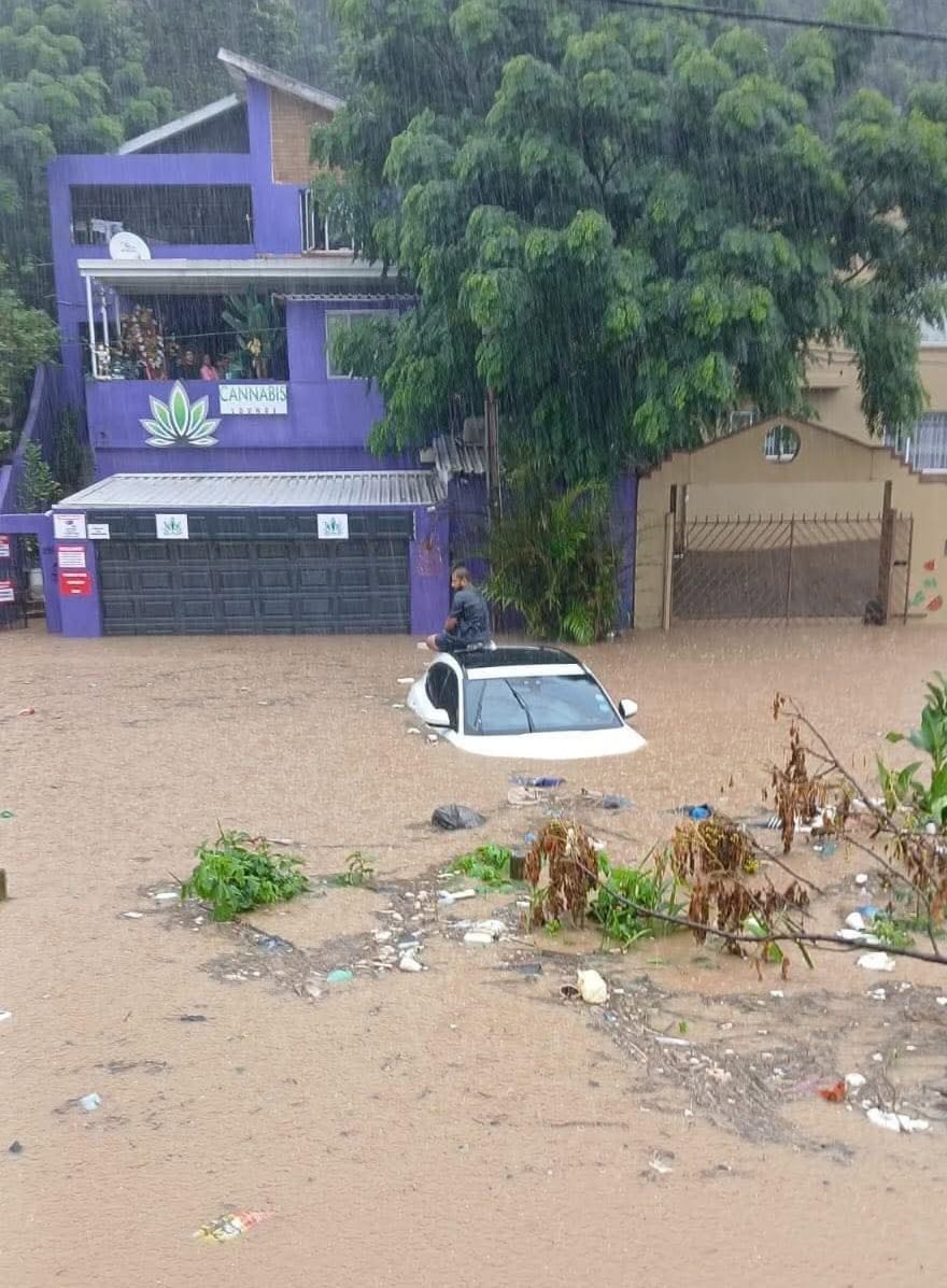 WATCH | Flood nightmare: Man trapped on car roof! | Daily Sun