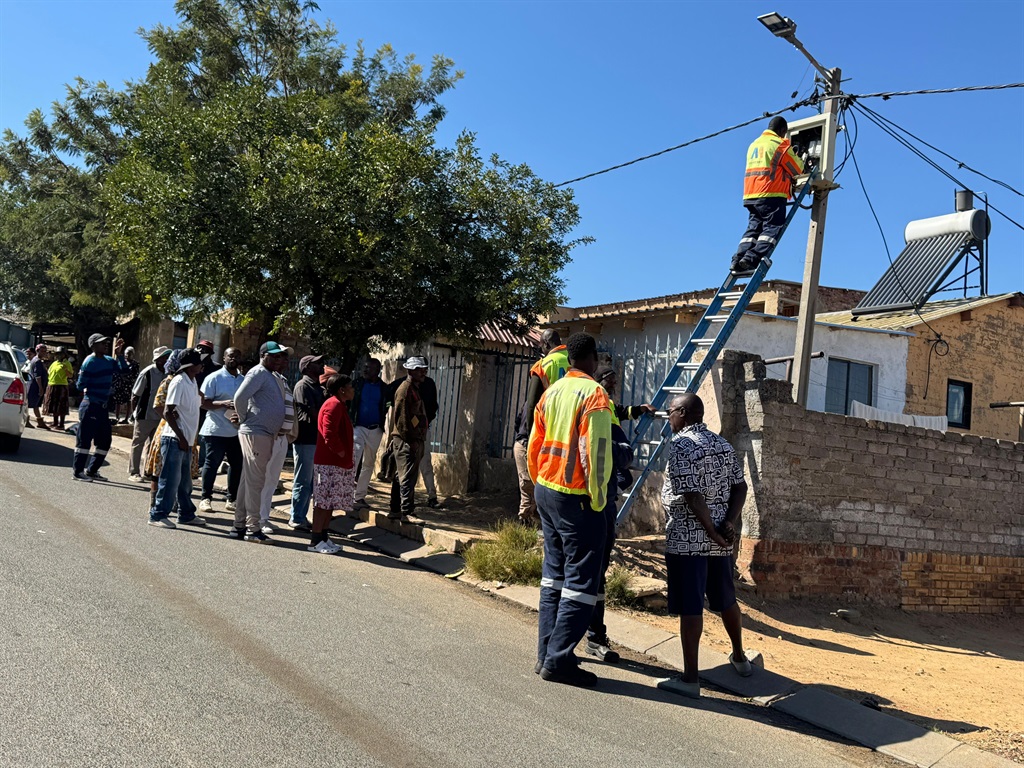 Kasi lights back on after meter war | Daily Sun