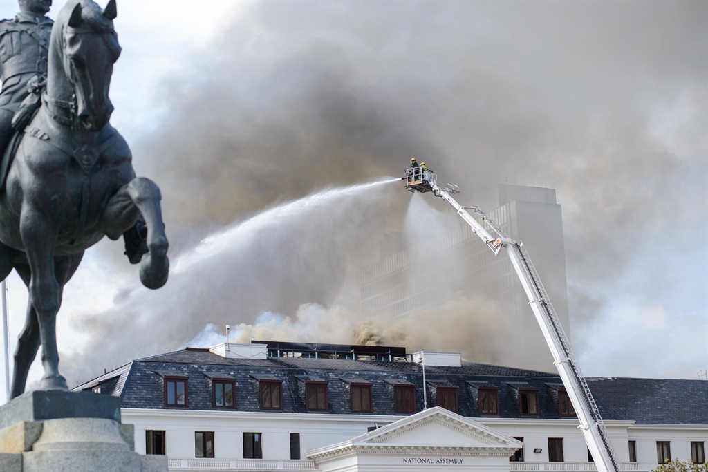 Photos | Day 2 as the roof of Parliament lights up in flames | News24