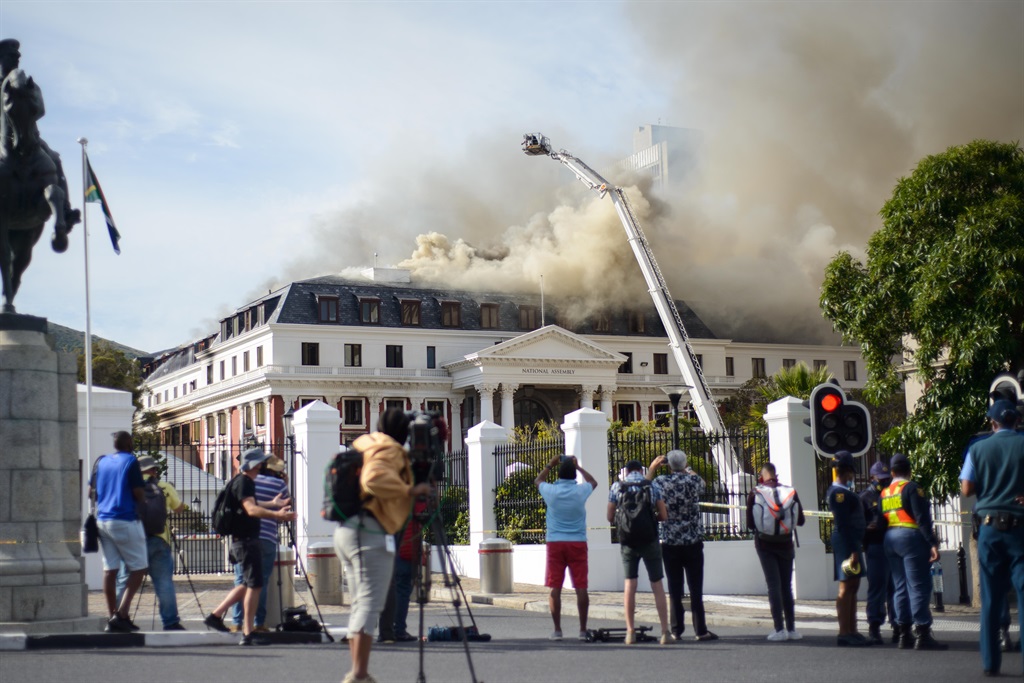 Photos | Day 2 as the roof of Parliament lights up in flames | News24