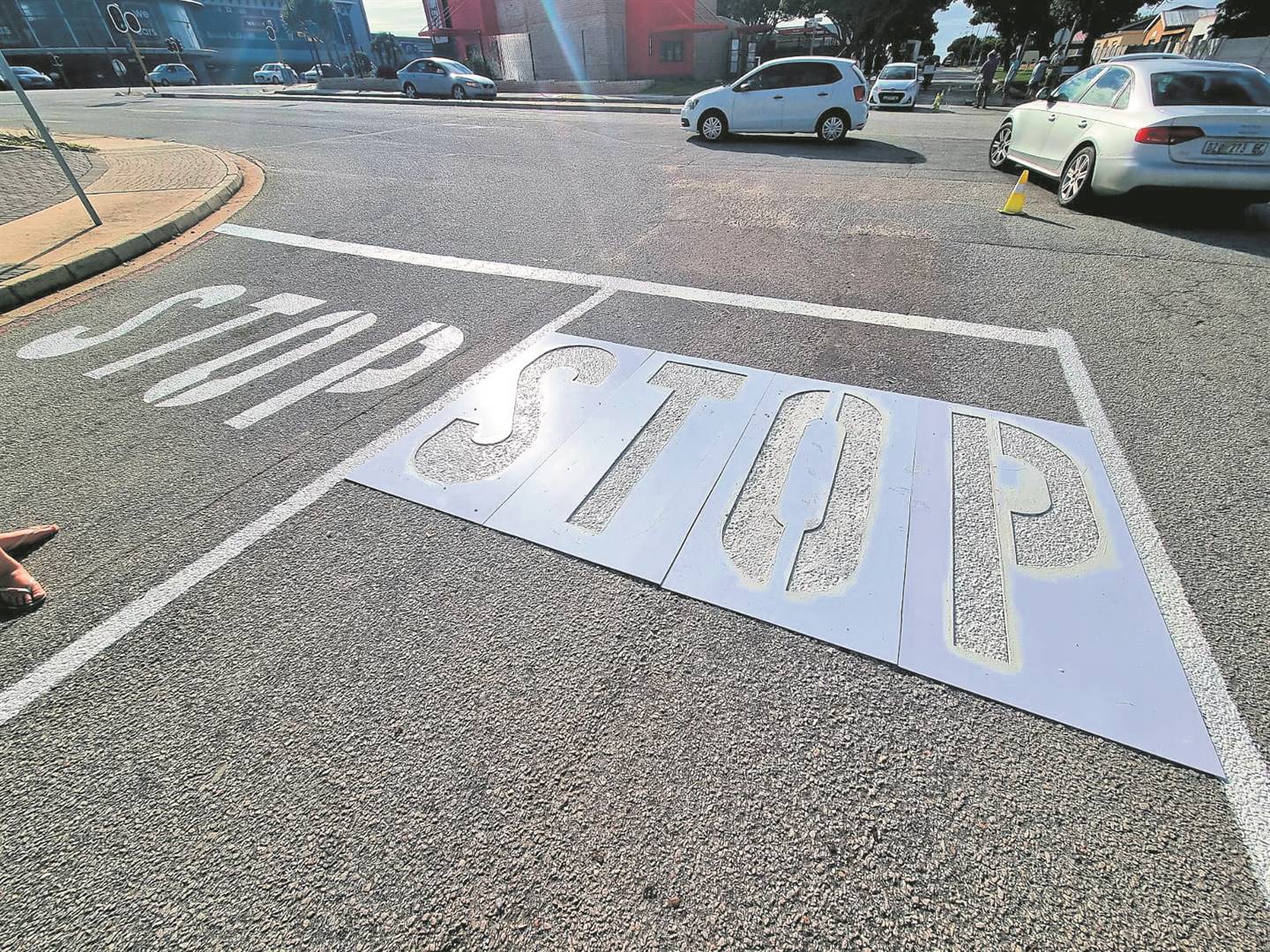 Residents come together to repaint street markings | News24