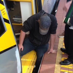 Watch as a group of strangers lift a train off a trapped man | News24
