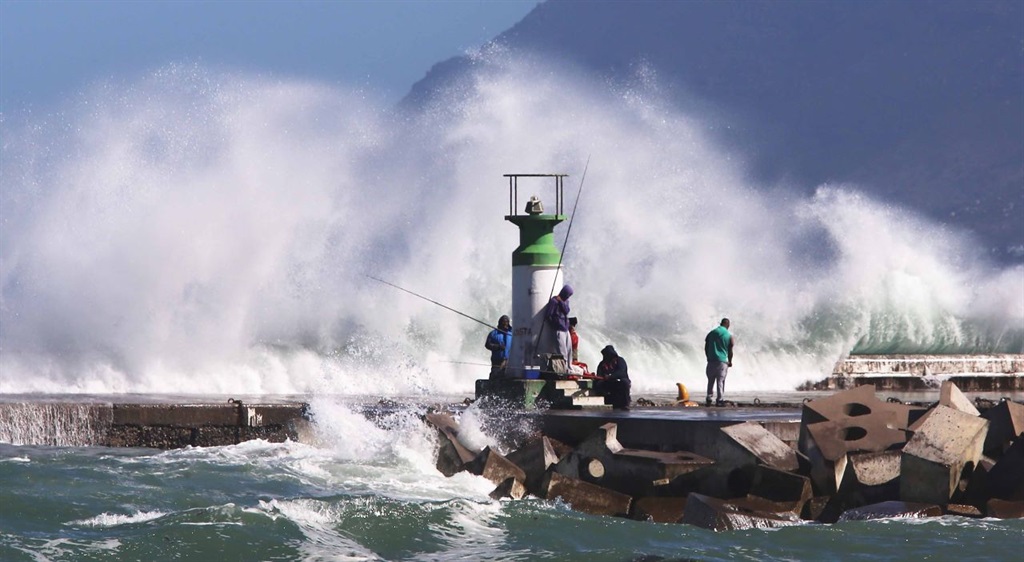 Brandon the brave: Unknown bystander helps rescue two men swept off ...