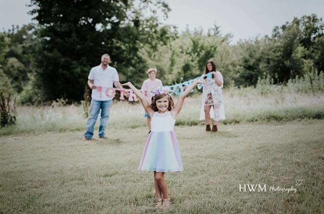 Parents celebrate trans daughter's transition with gender reveal ...