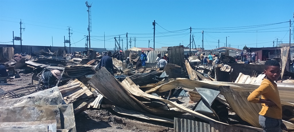 Fire victims scramble to rebuild their lives after blaze tears down ...