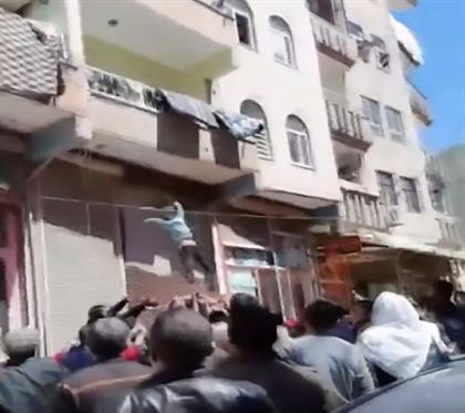 Heroic man catches toddler falling from balcony | News24
