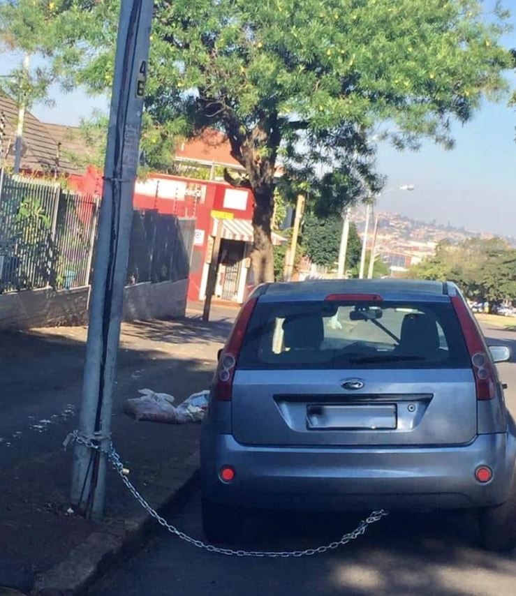 PIC: Motorist finds novel way to safeguard car - by chaining it to ...