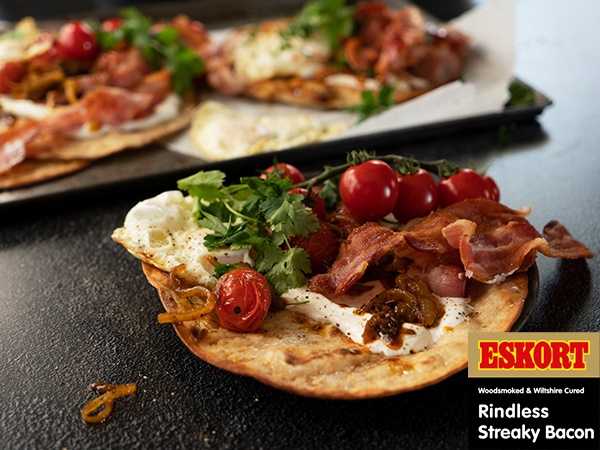 Toasted bacon & egg wraps with masala cherry tomatoes | News24